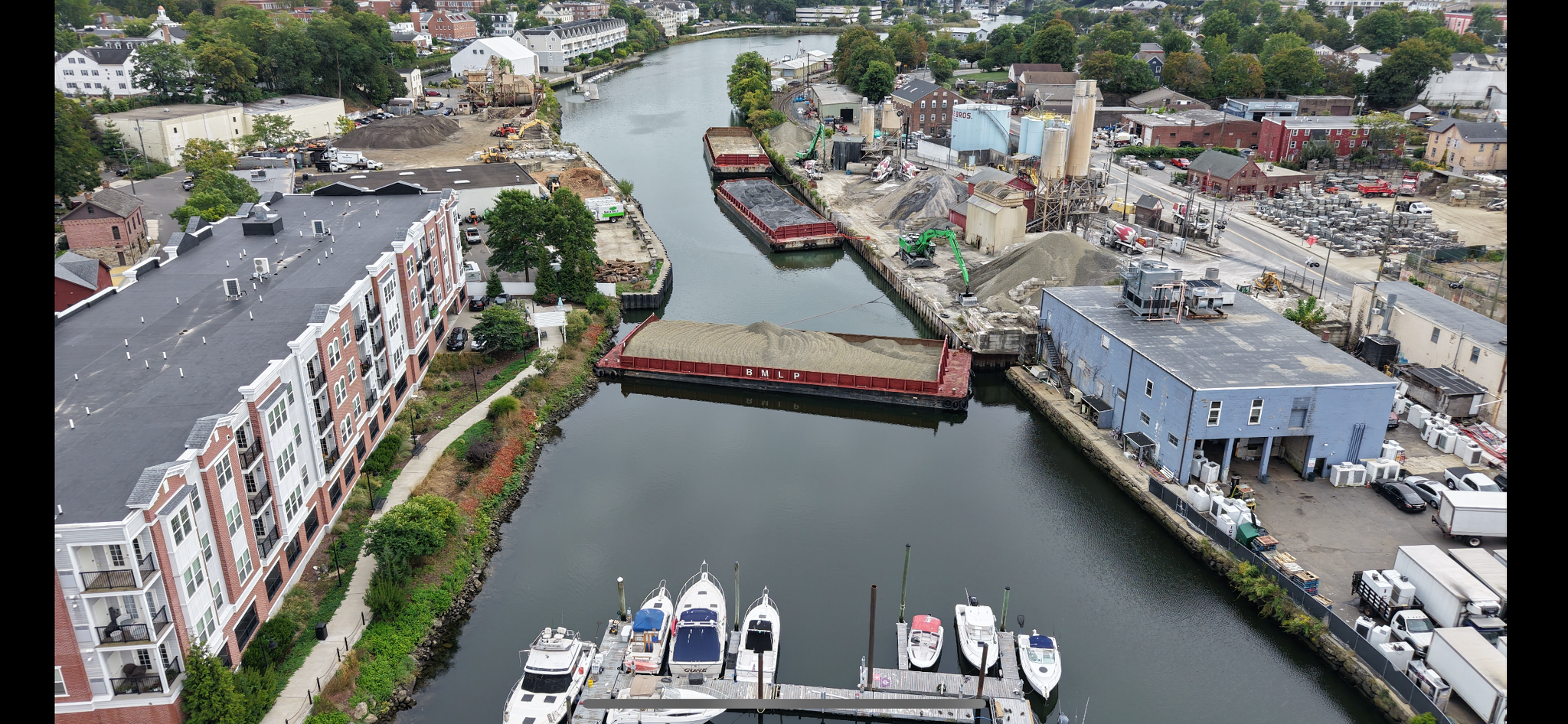 Norwalk River blocked by 100-foot barge, officials say