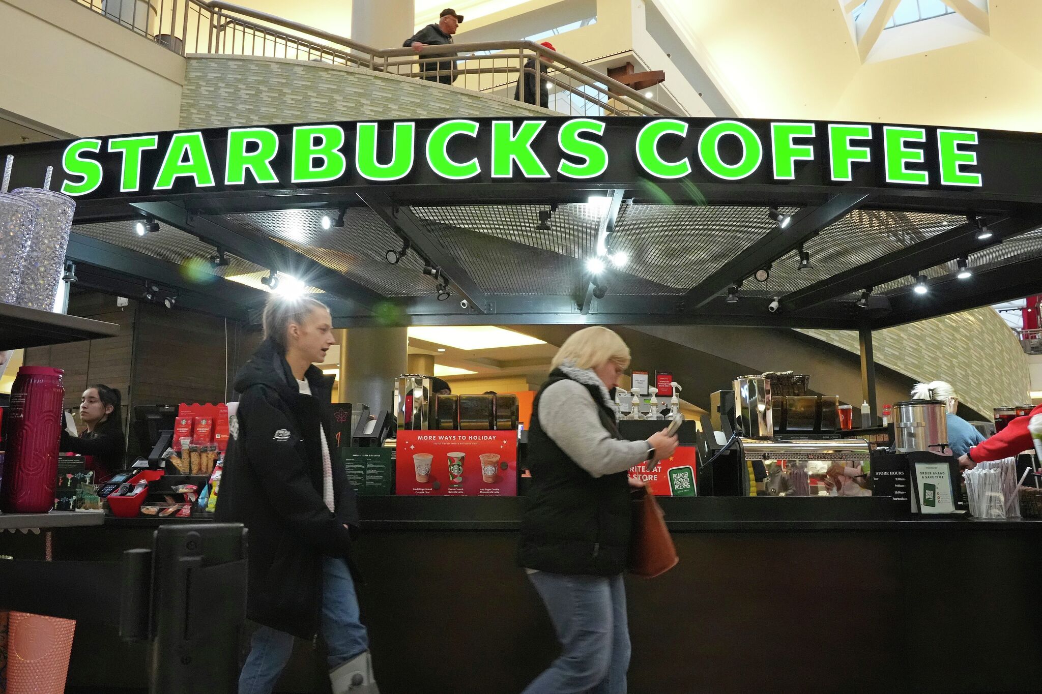 Starbucks is closing stores, laying off hundreds of workers