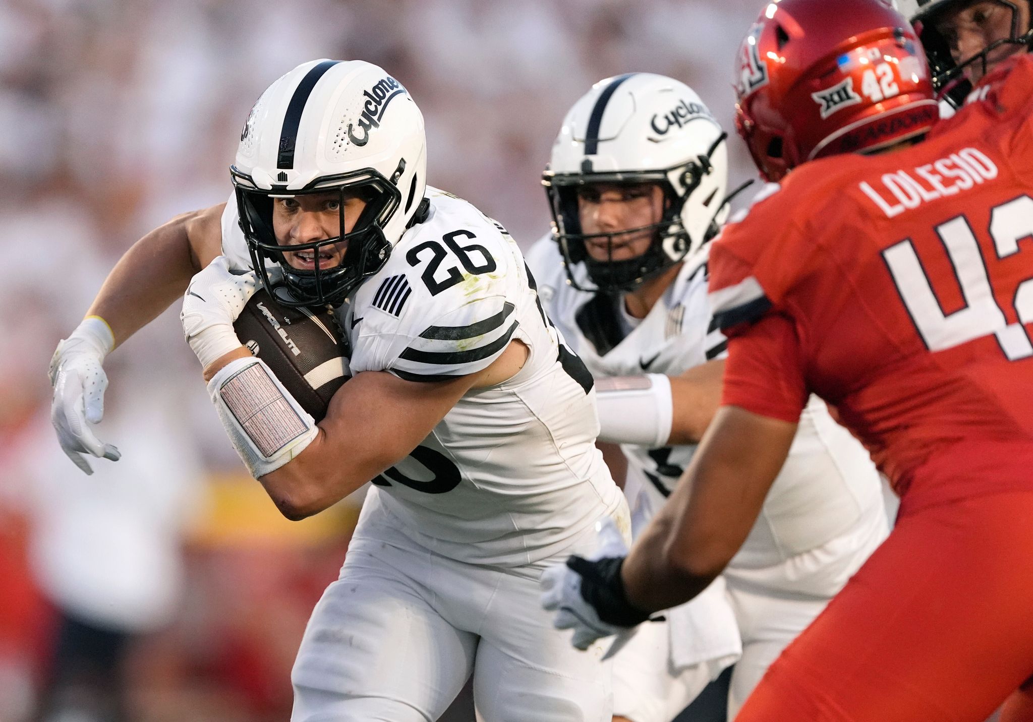 Becht runs for 3 touchdowns, No. 14 Iowa State beats Arizona 39-14