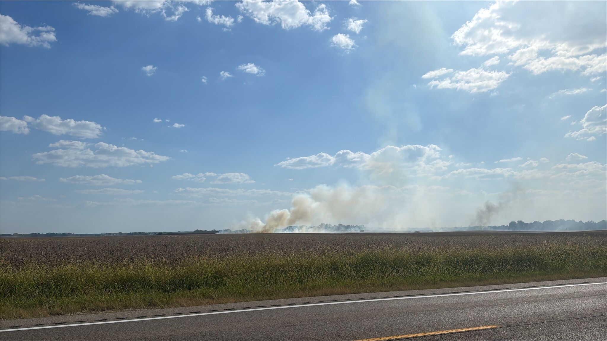 Crews battle field fire near Edwardsville IL