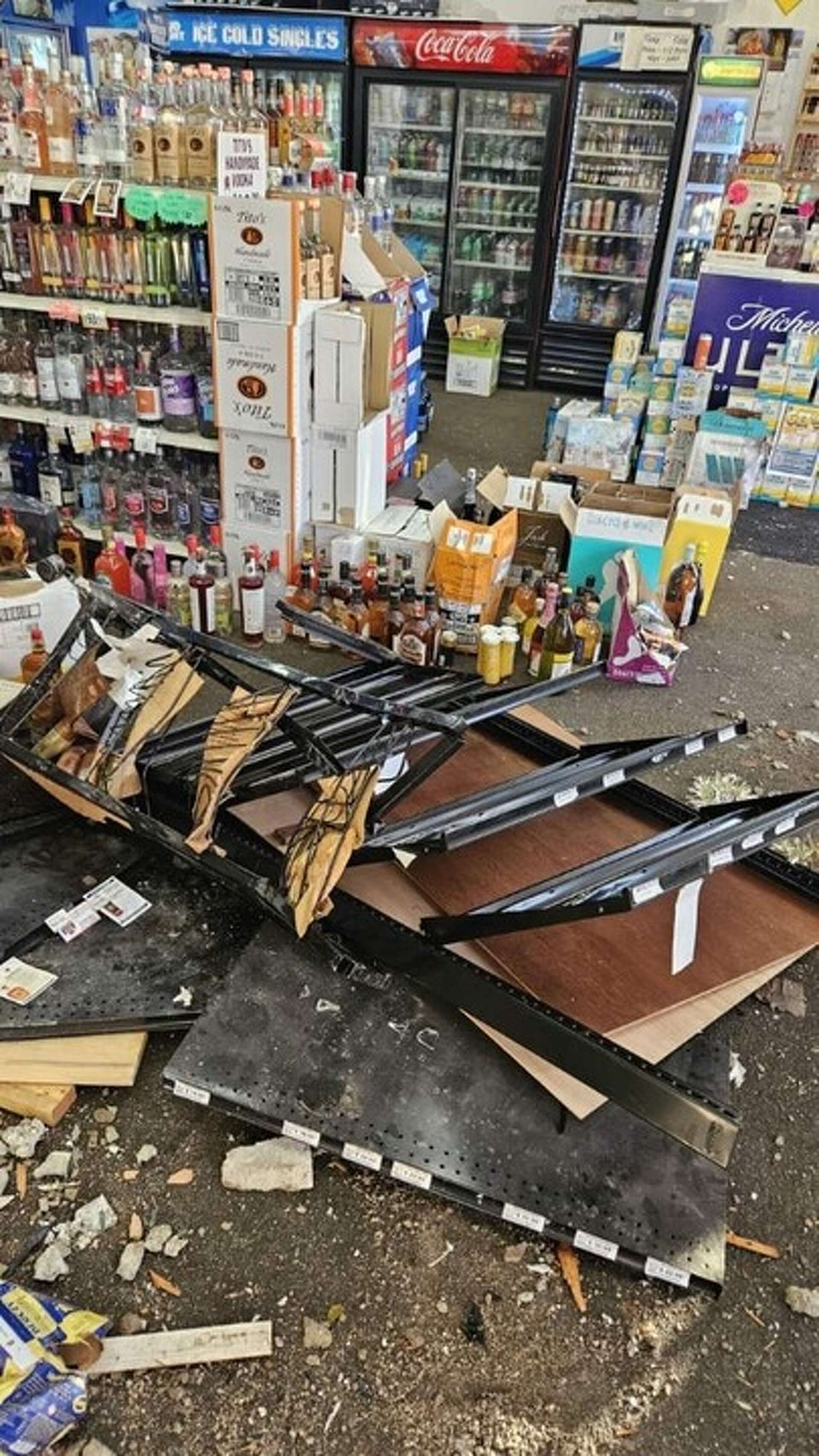 Enfield package store seriously damaged in fatal crash, owner says