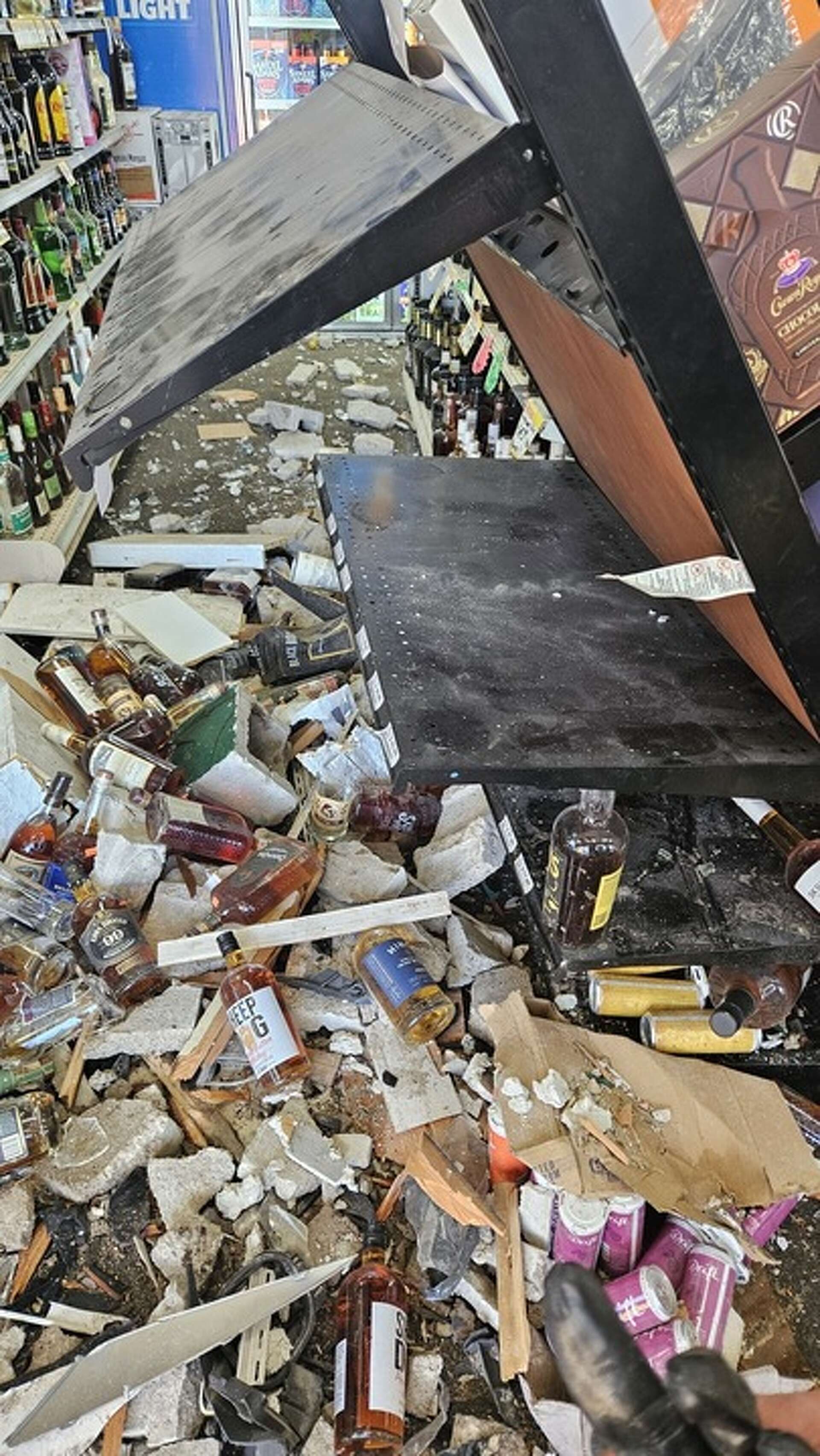 Enfield package store seriously damaged in fatal crash, owner says
