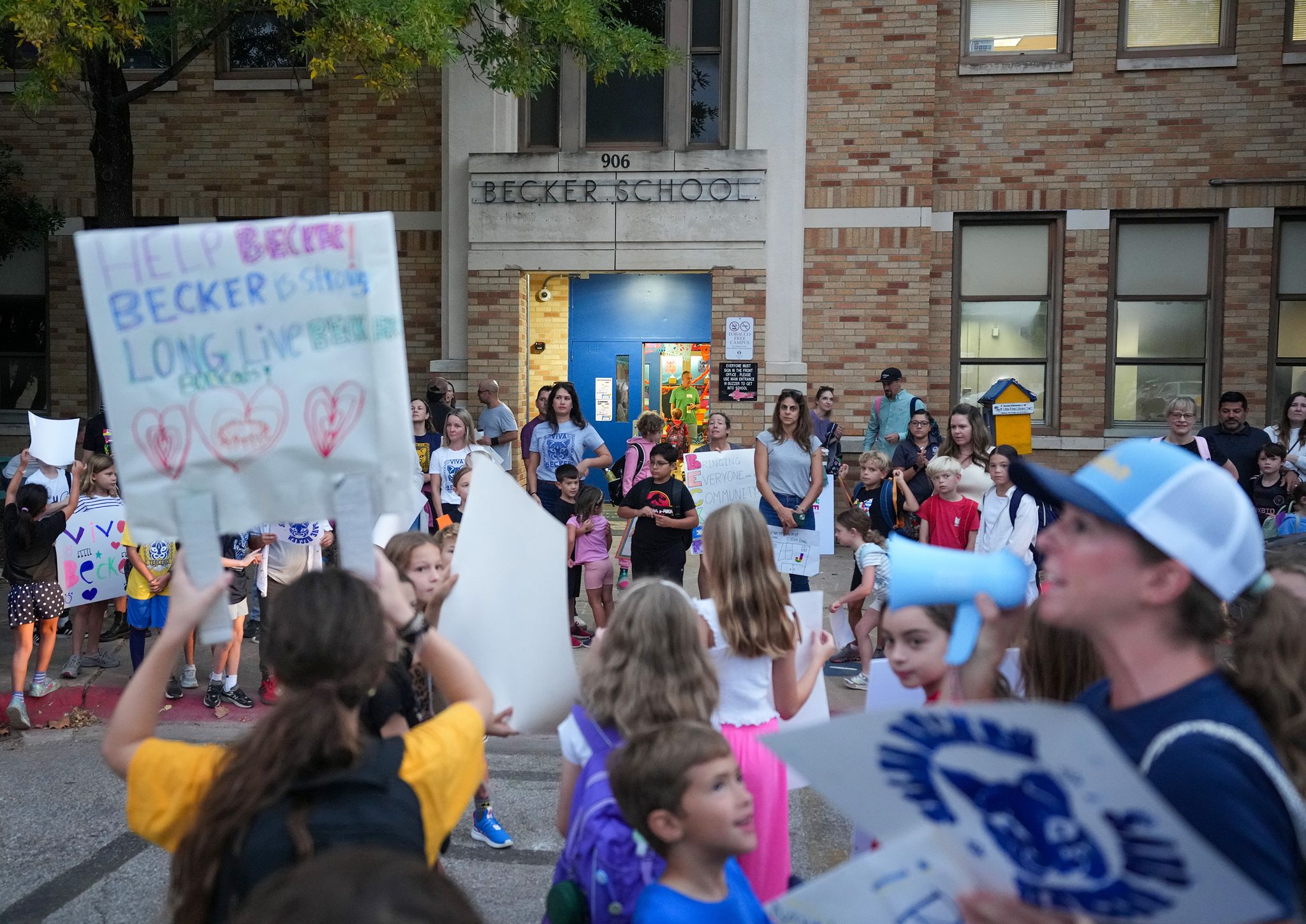 Becker parents, students rally to keep dual language campus open