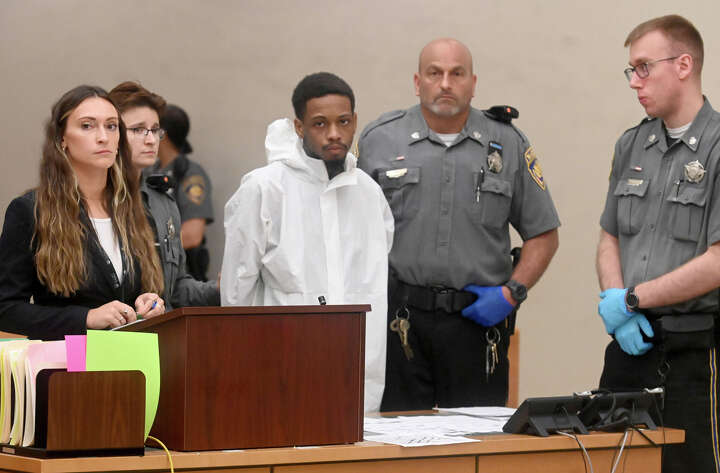 Homeowner says he confronted Waterbury murder suspect