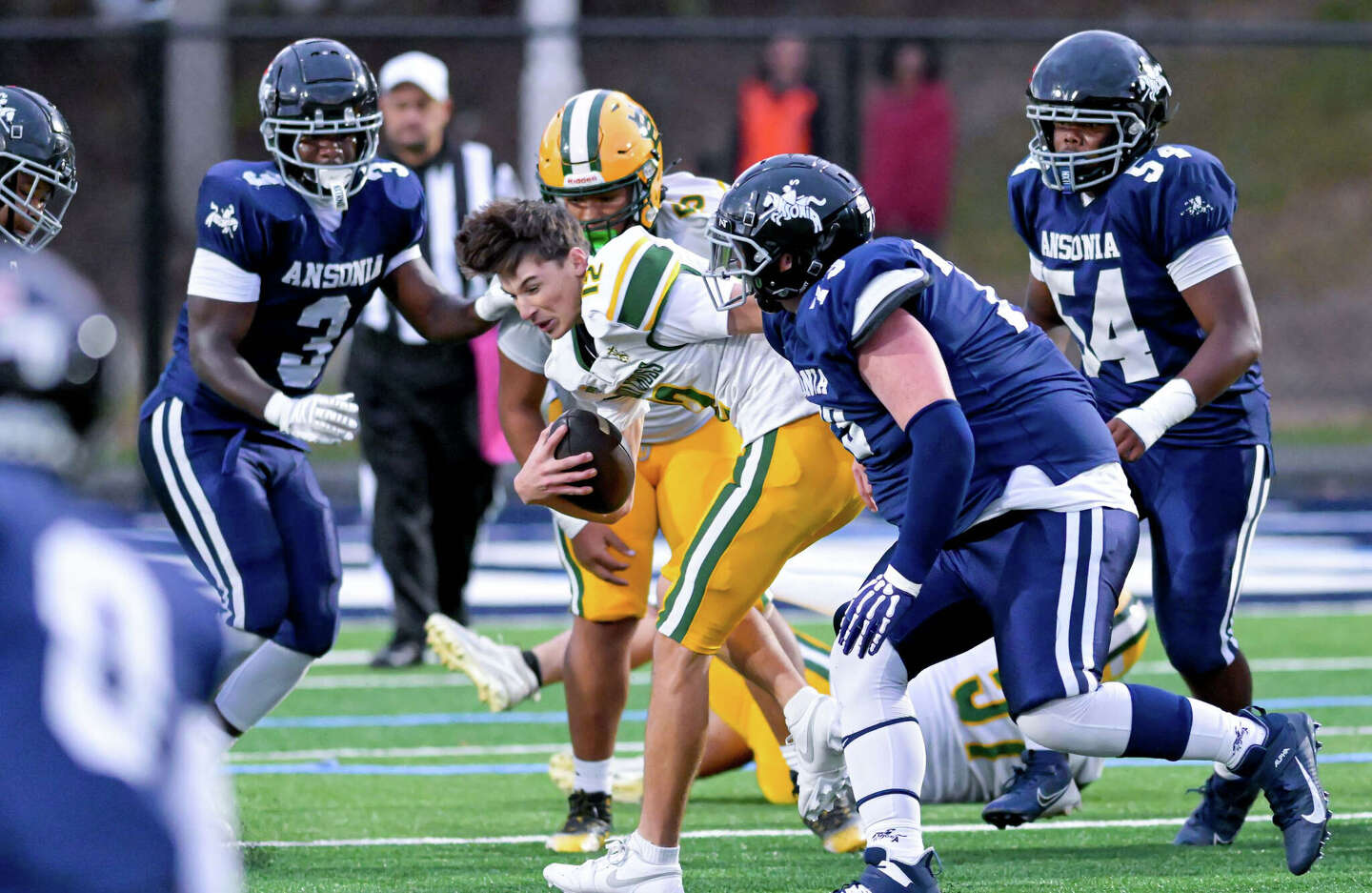 Ansonia football holds on for tight win over Holy Cross