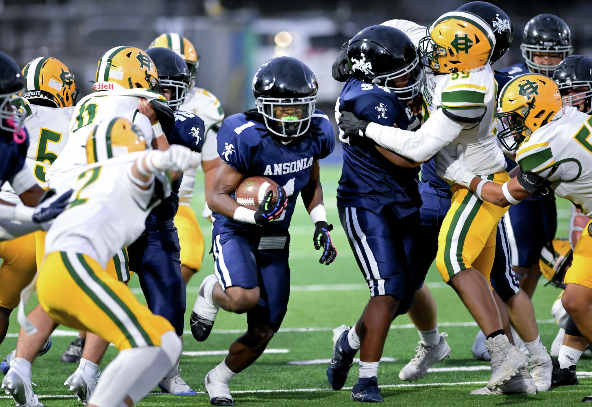 Ansonia football holds on for tight win over Holy Cross