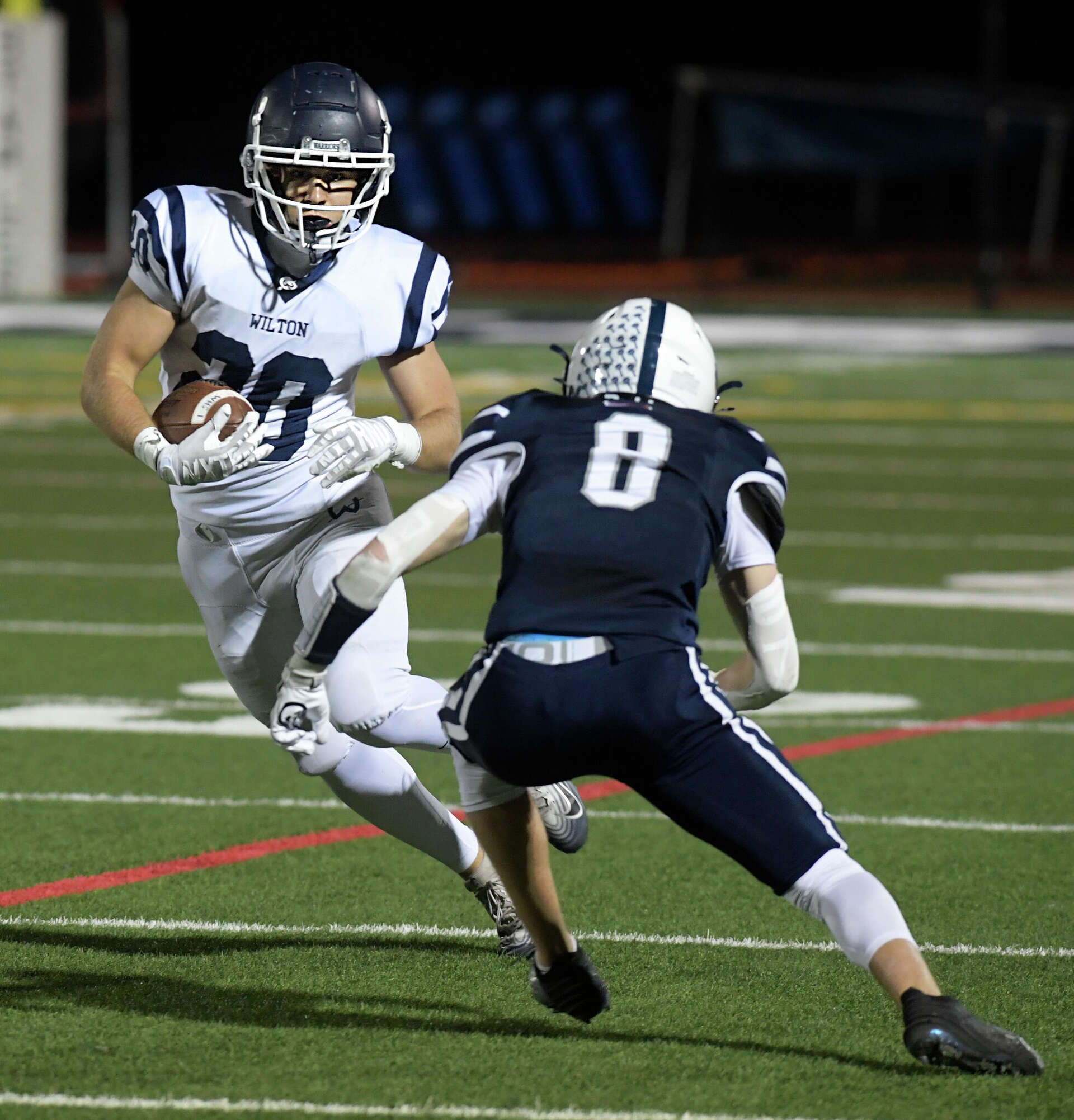 Wilton football runs wild in victory over Staples in Westport