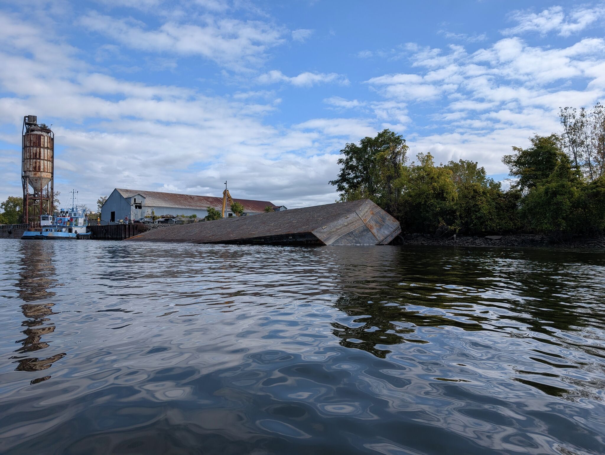 Industrial barge flips in Hudson at Colarusso waterfront dock