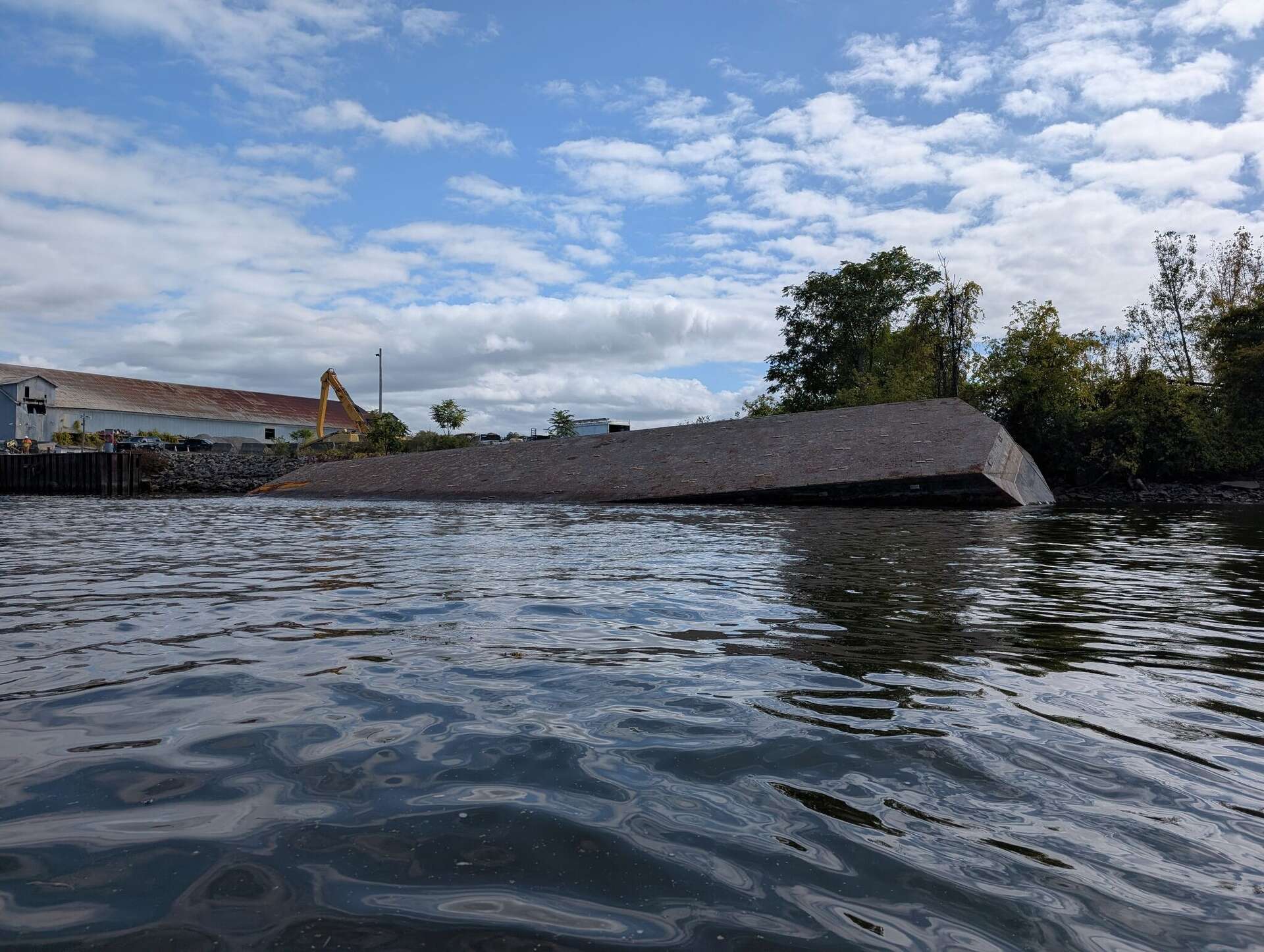 Industrial barge flips in Hudson at Colarusso waterfront dock