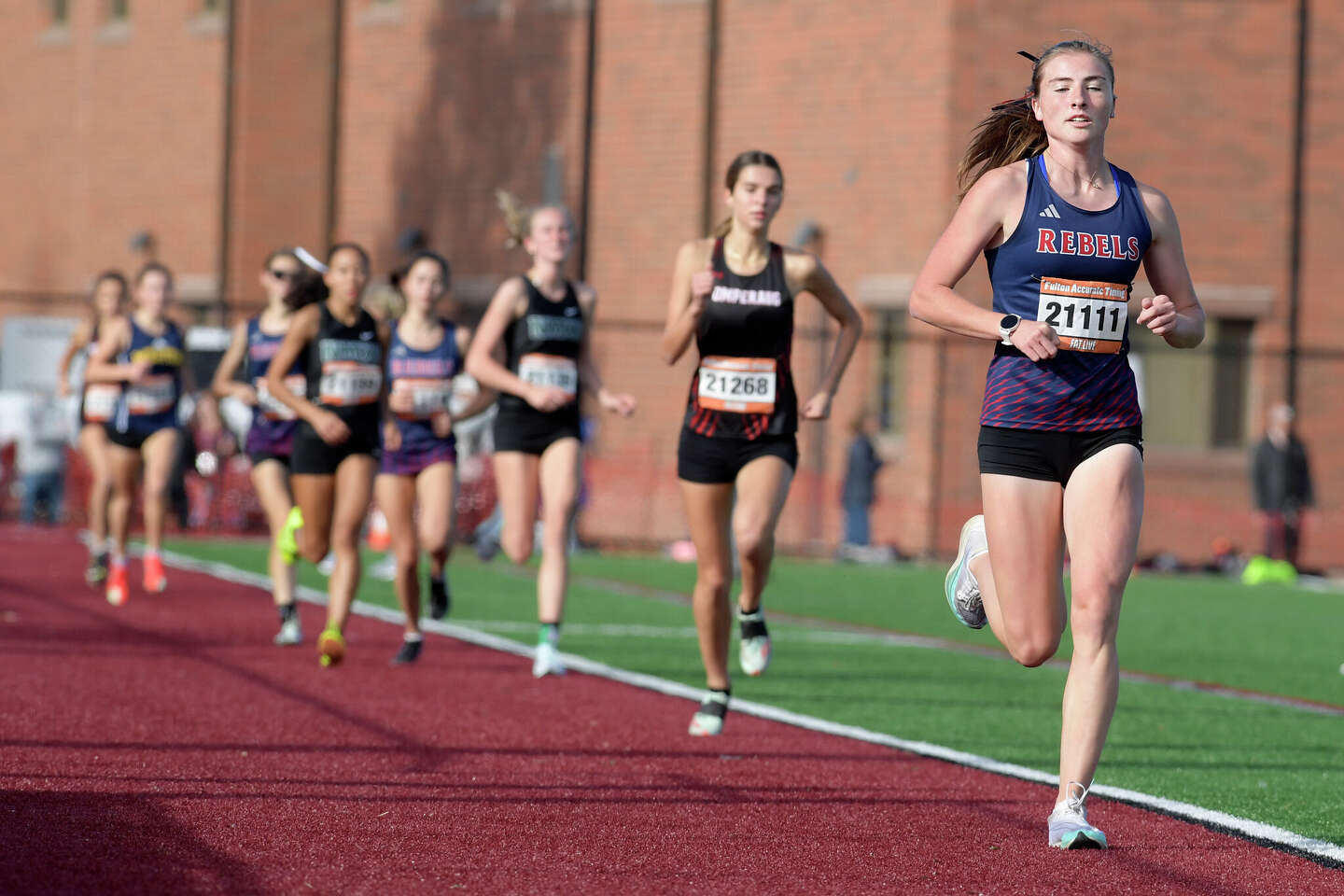 The Newtown boys and Pomperaug girls XC teams claim SWC titles