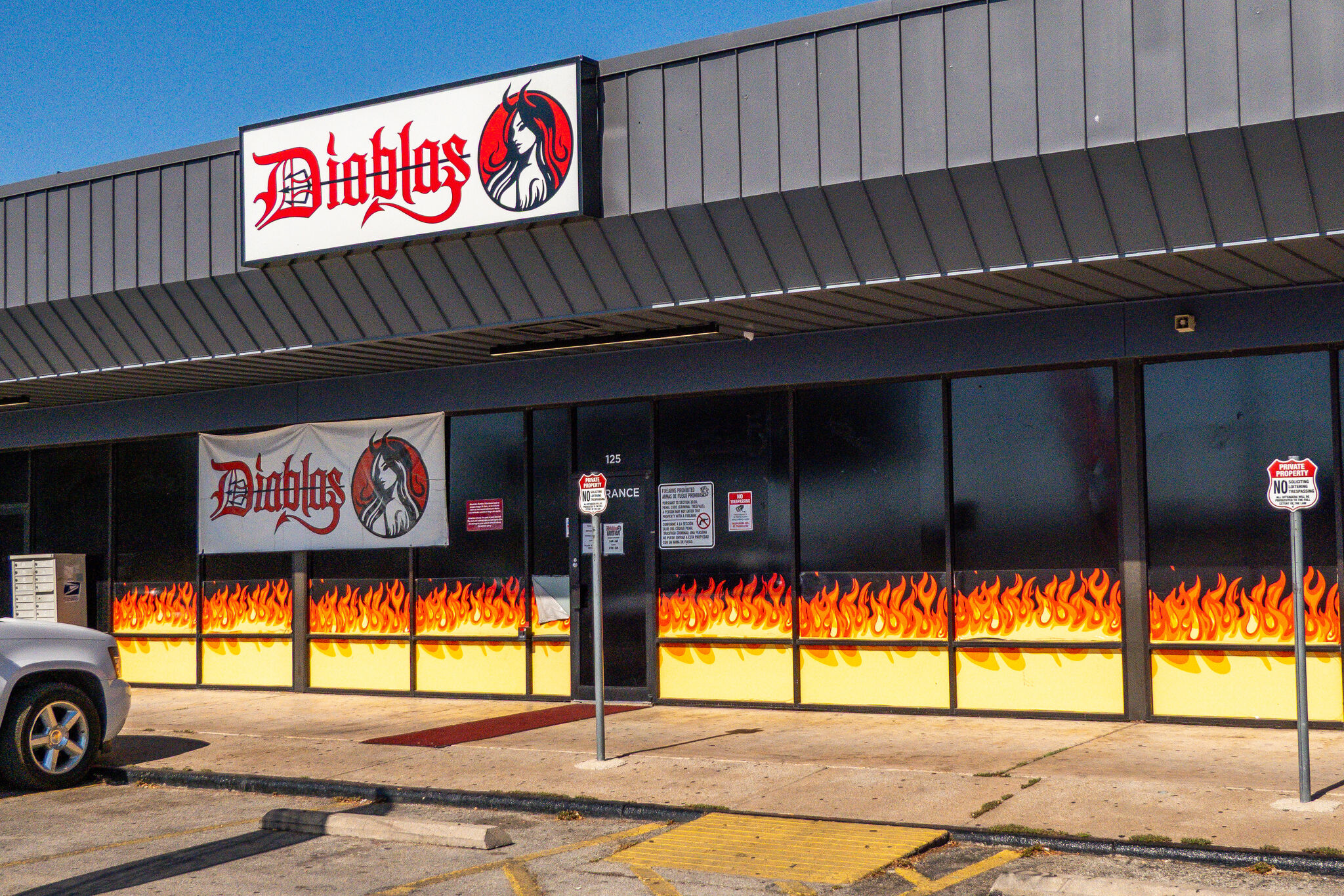 'Crime den' raided in Austin, local businesses speak up