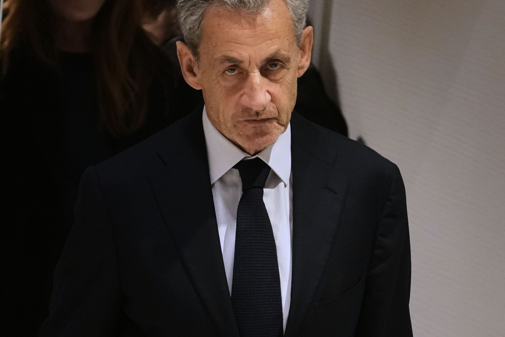 Nicolas Sarkozy going from France's presidential palace to a Paris prison