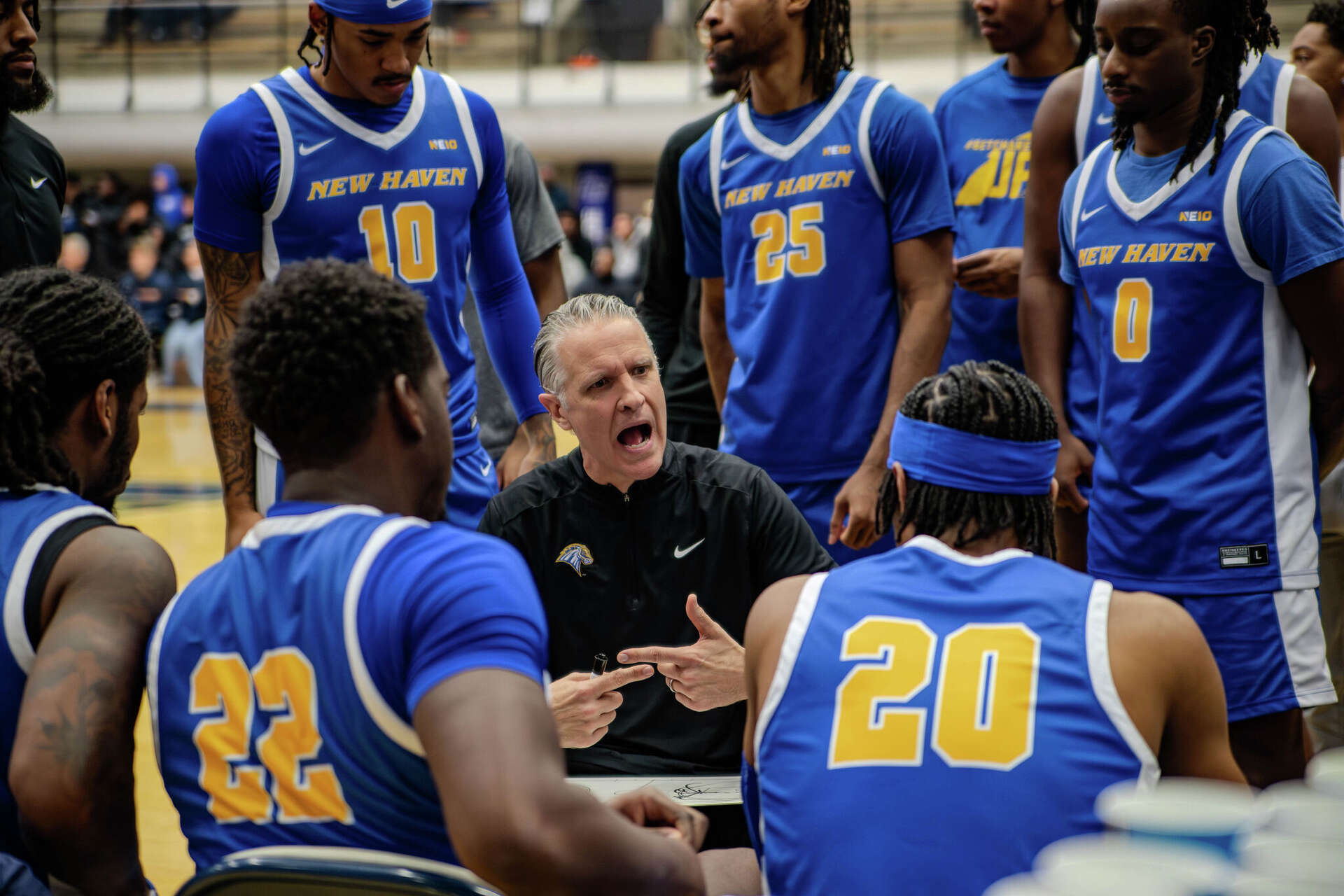 New Haven basketball team opens Division I era at UConn