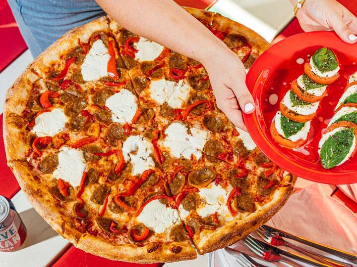 Home Slice Pizza reopens after sudden fire in Austin