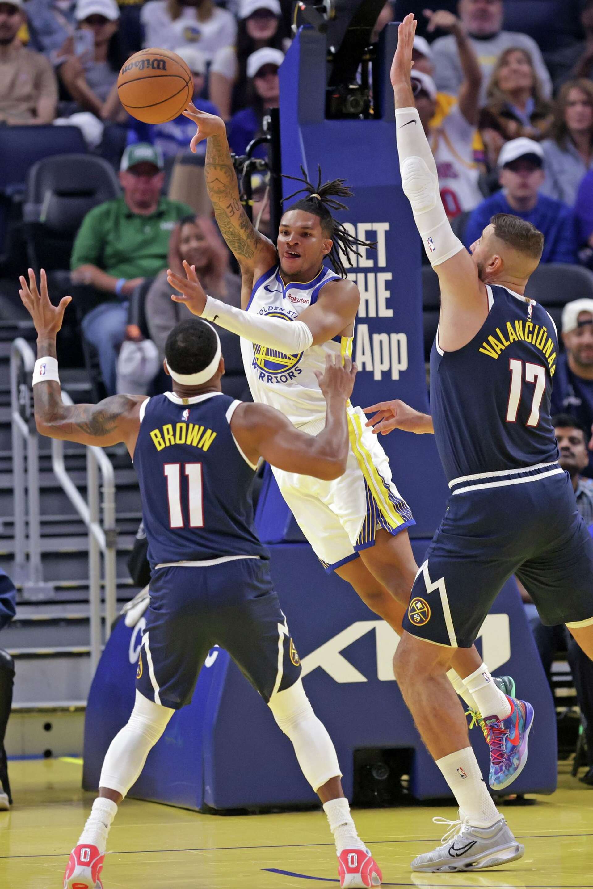 Warriors outlast Nuggets in OT as Steph Curry scores 42 in home opener