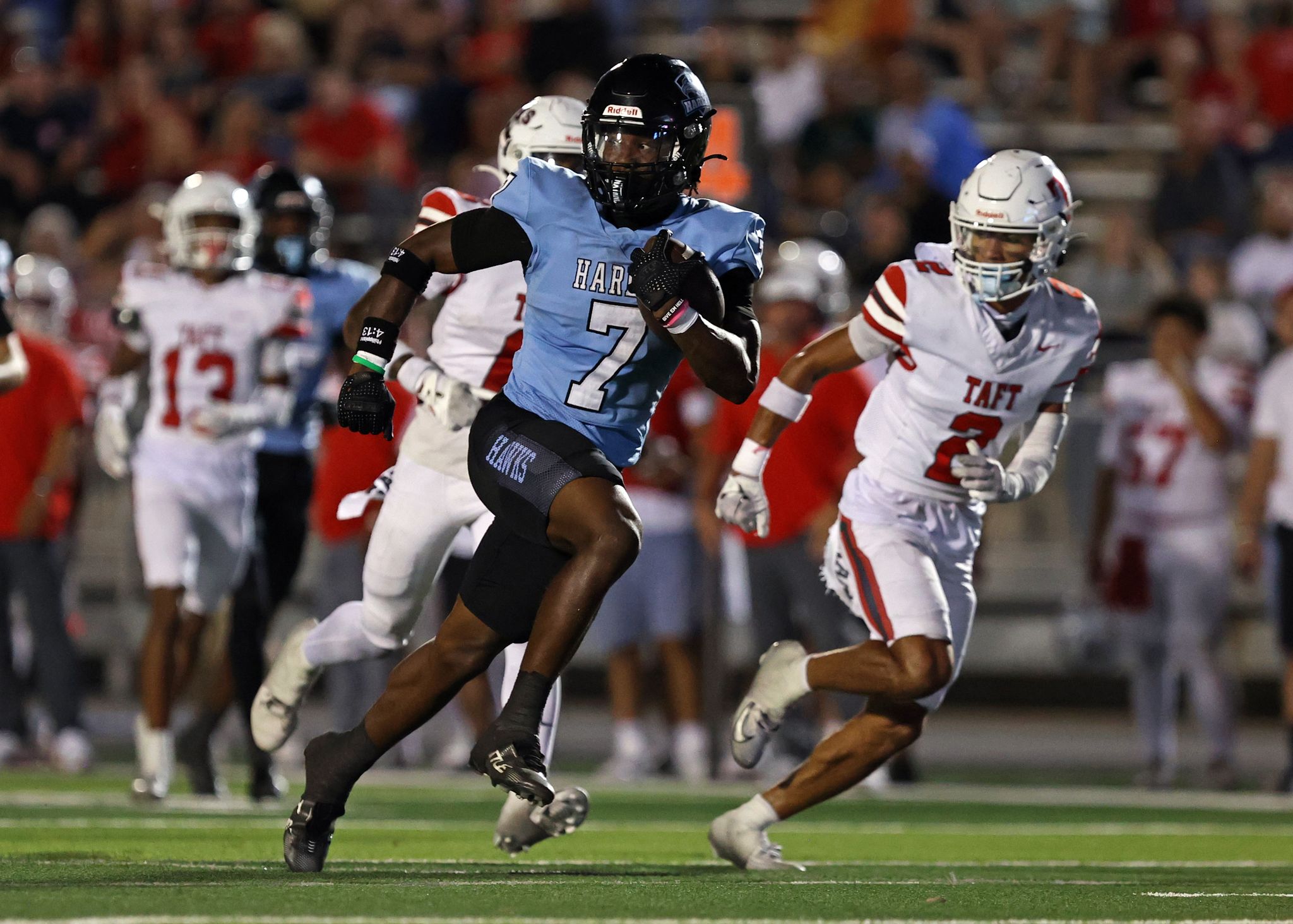 Aldric Trotter leads Harlan football to dominant win over Taft