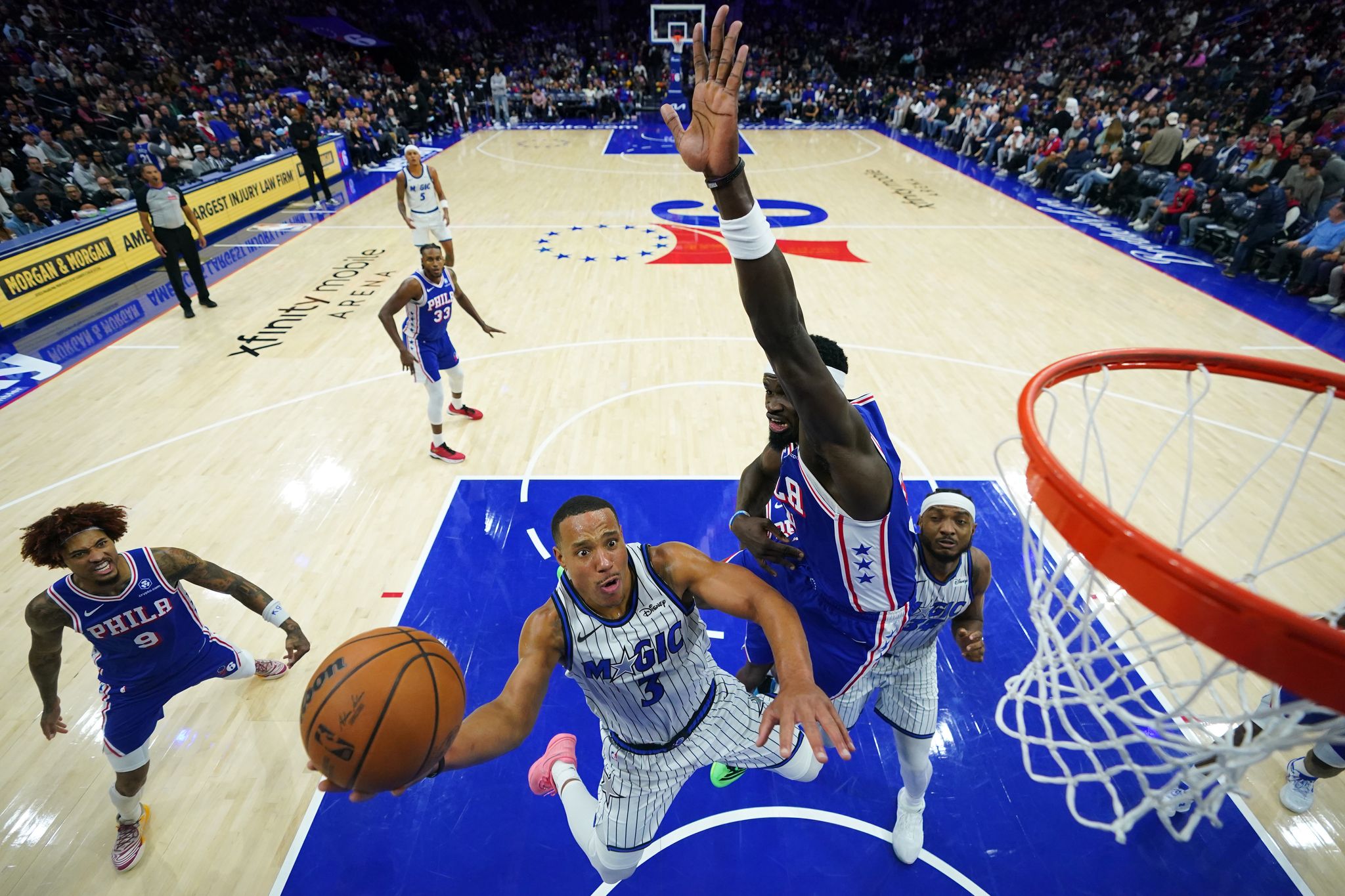 76ers stay undefeated with 136-124 win over Magic