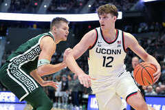 UConn's Eric Reibe starts first game with mixed results