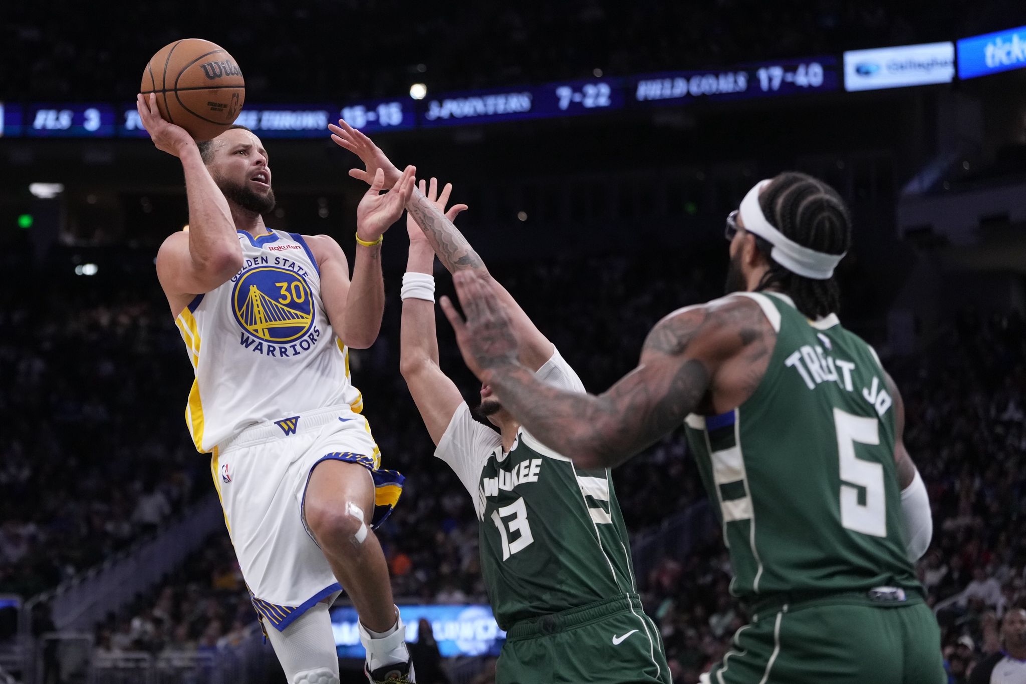 Rollins shines again as Bucks beat Warriors 120-110 without Antetokounmpo