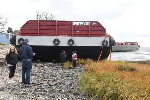Crews remove 140-foot barges stuck in West Haven, officials say