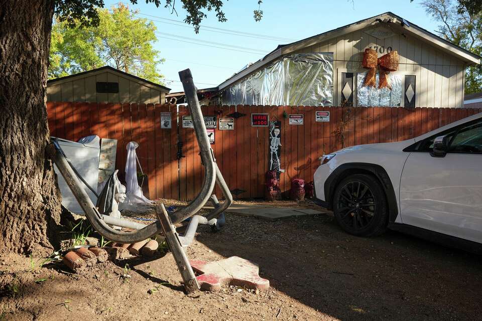Restrained woman found in Austin yard had been starved, shot: police