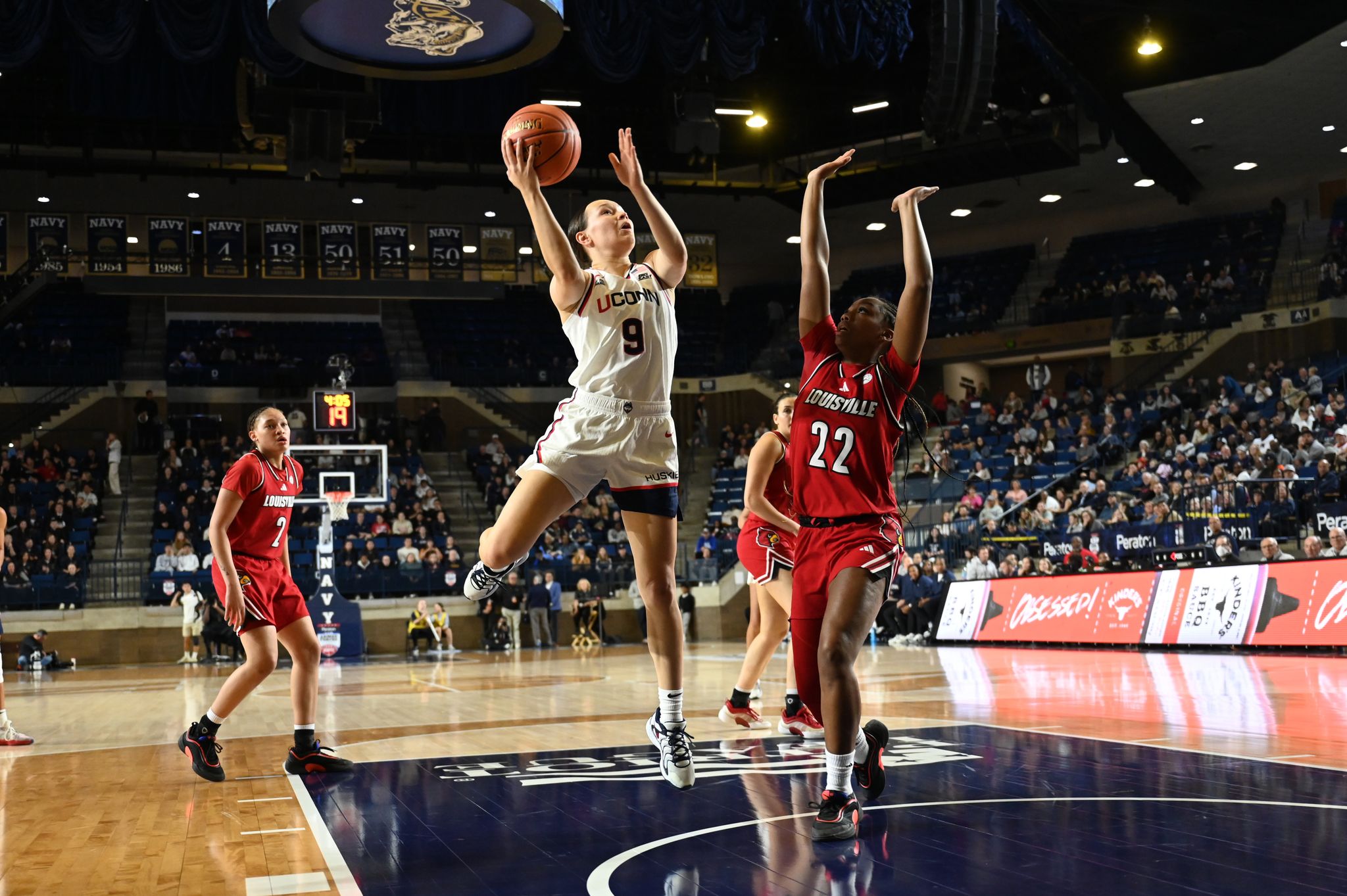 No. 1 UConn beats No. 20 Louisville 79-66 in Armed Forces Classic