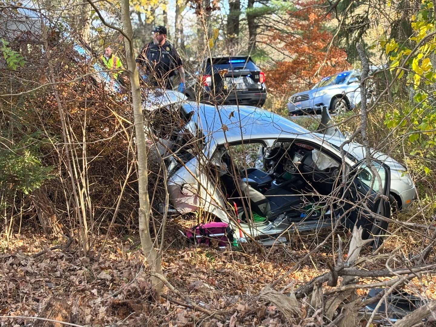 Avon firefighters rescue 2 trapped in car after Lovely Street crash