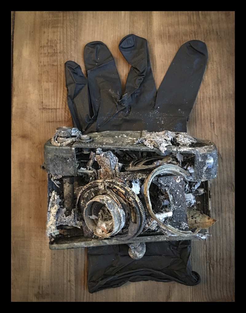 Photographer loses camera collection in fire — then takes pictures of it