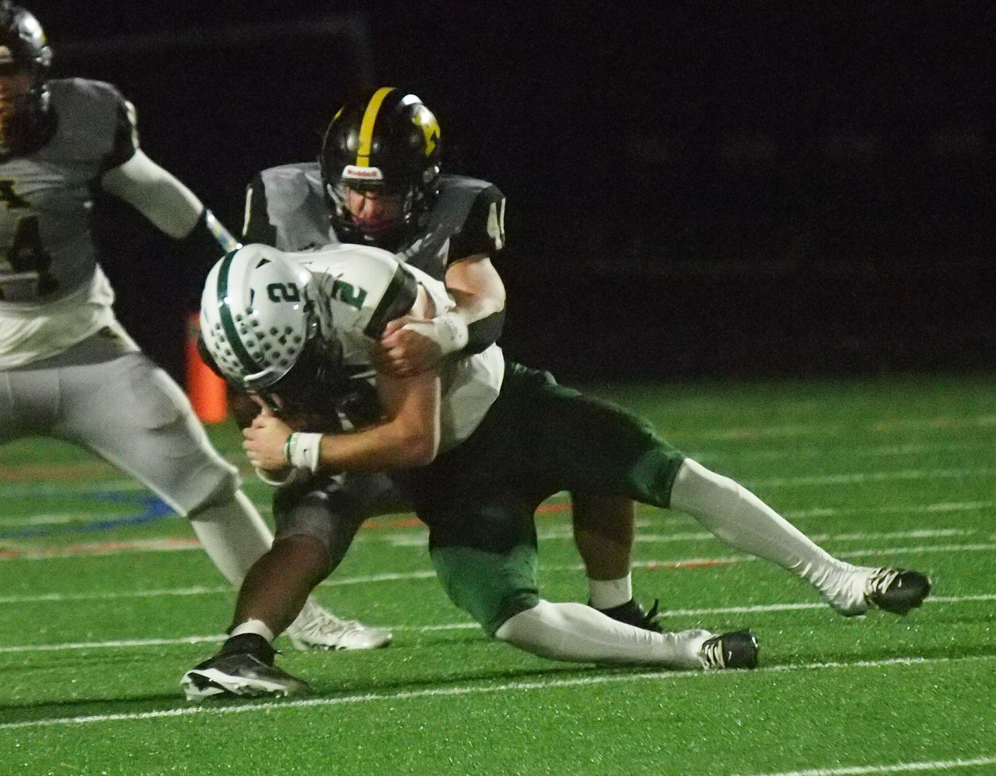 Guilford football team shuts out Amity in second half, moves to 7-1