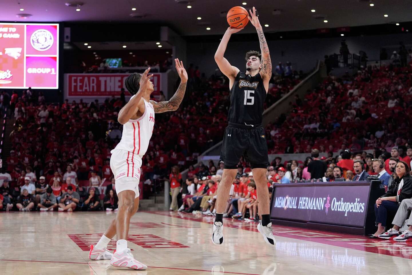 No. 2 Houston shuts down Towson down the stretch, improves to 2-0