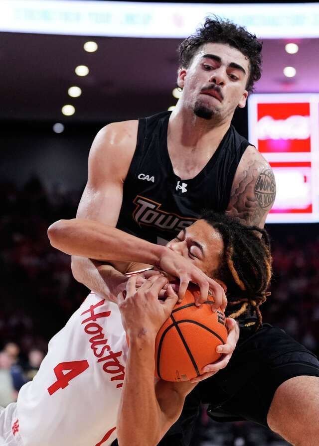 Kingston Flemings scores 20, No. 2 Houston beats Towson 65-48