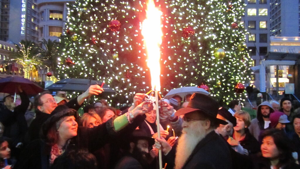Lighting of Bill Graham Menorah in Union Square to mark start of Hanukkah