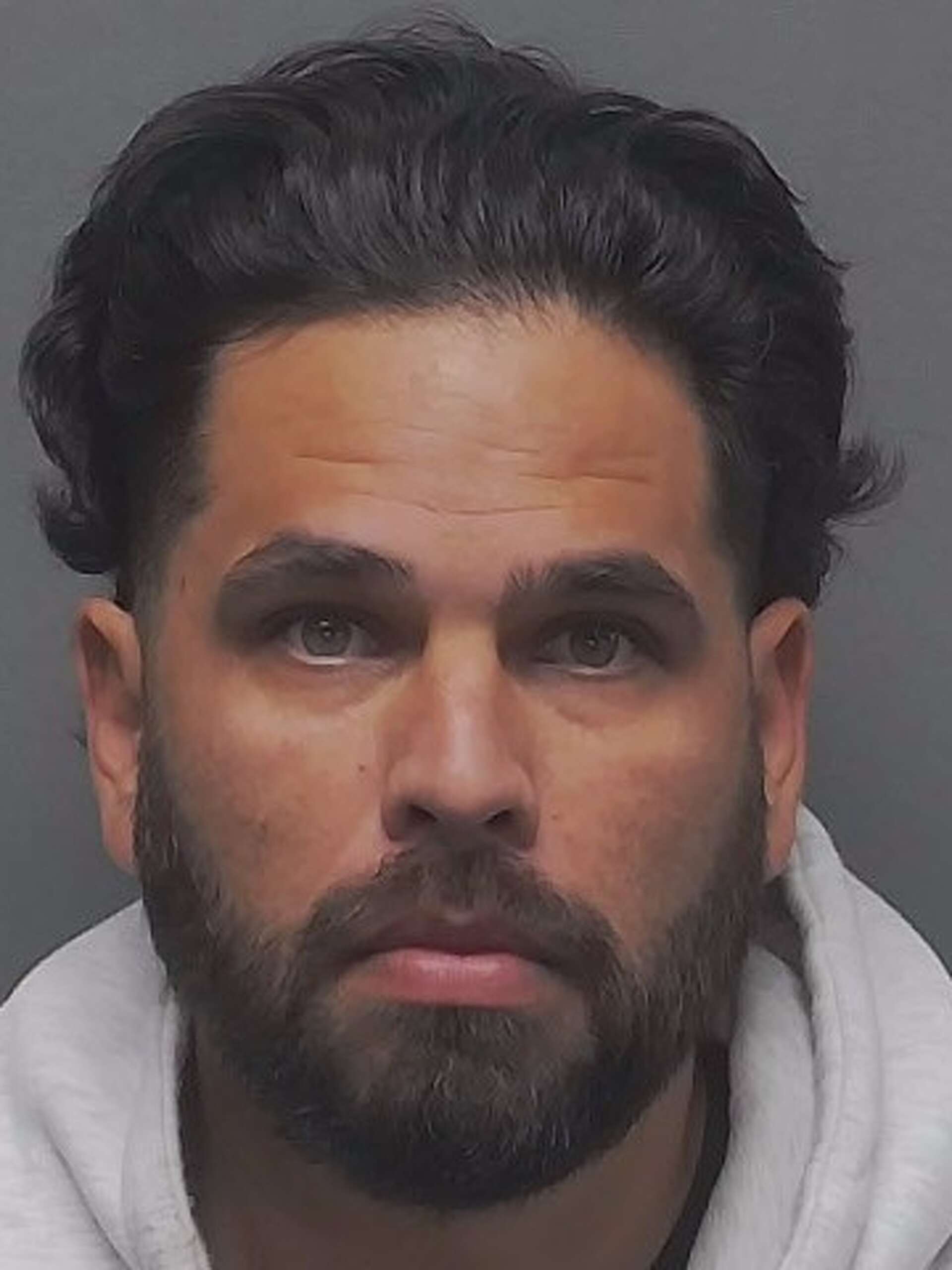 SAPD officer turns himself in after allegedly striking child in 2024