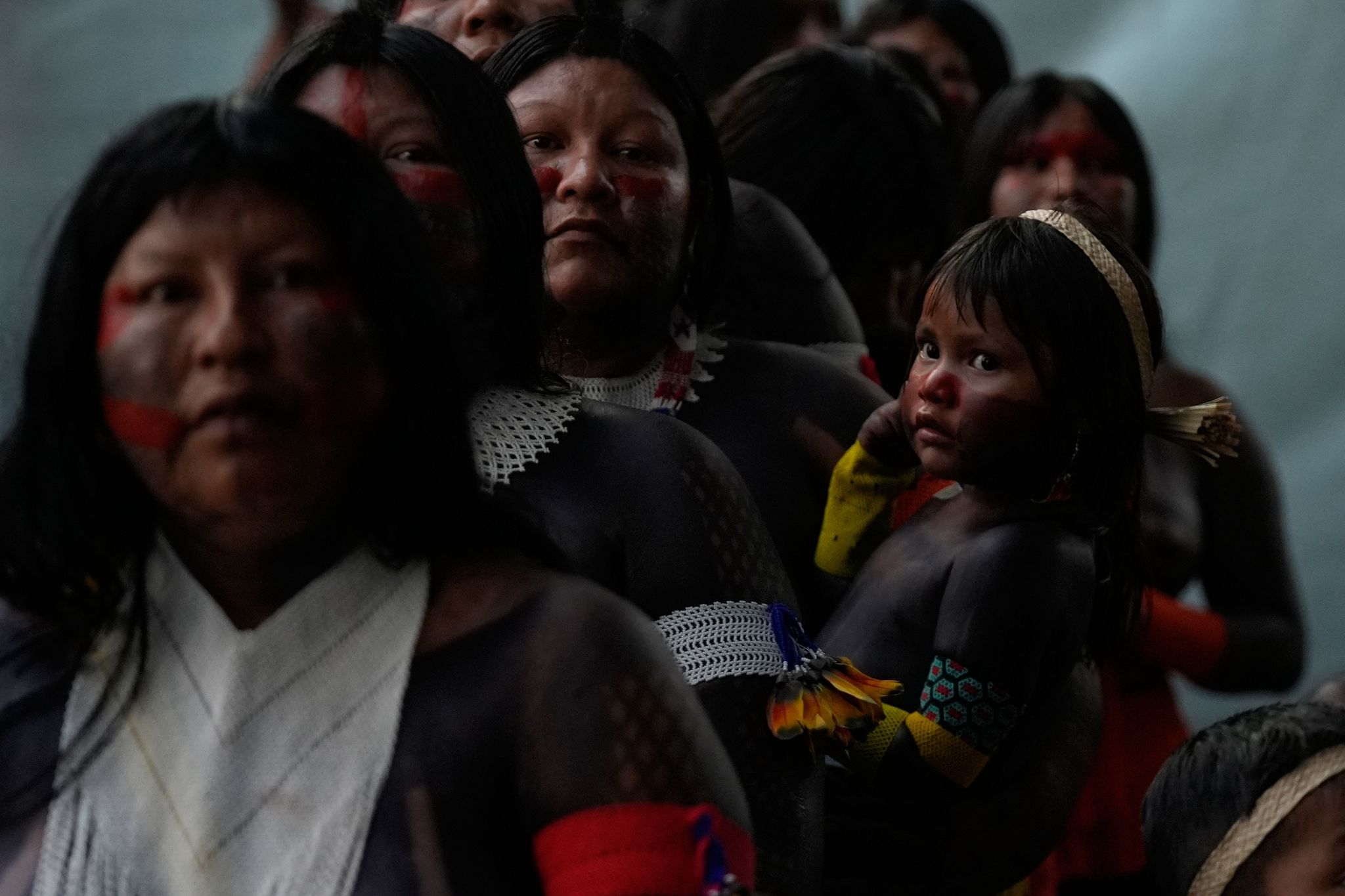 Photos show Indigenous participants at the People's Summit held ...