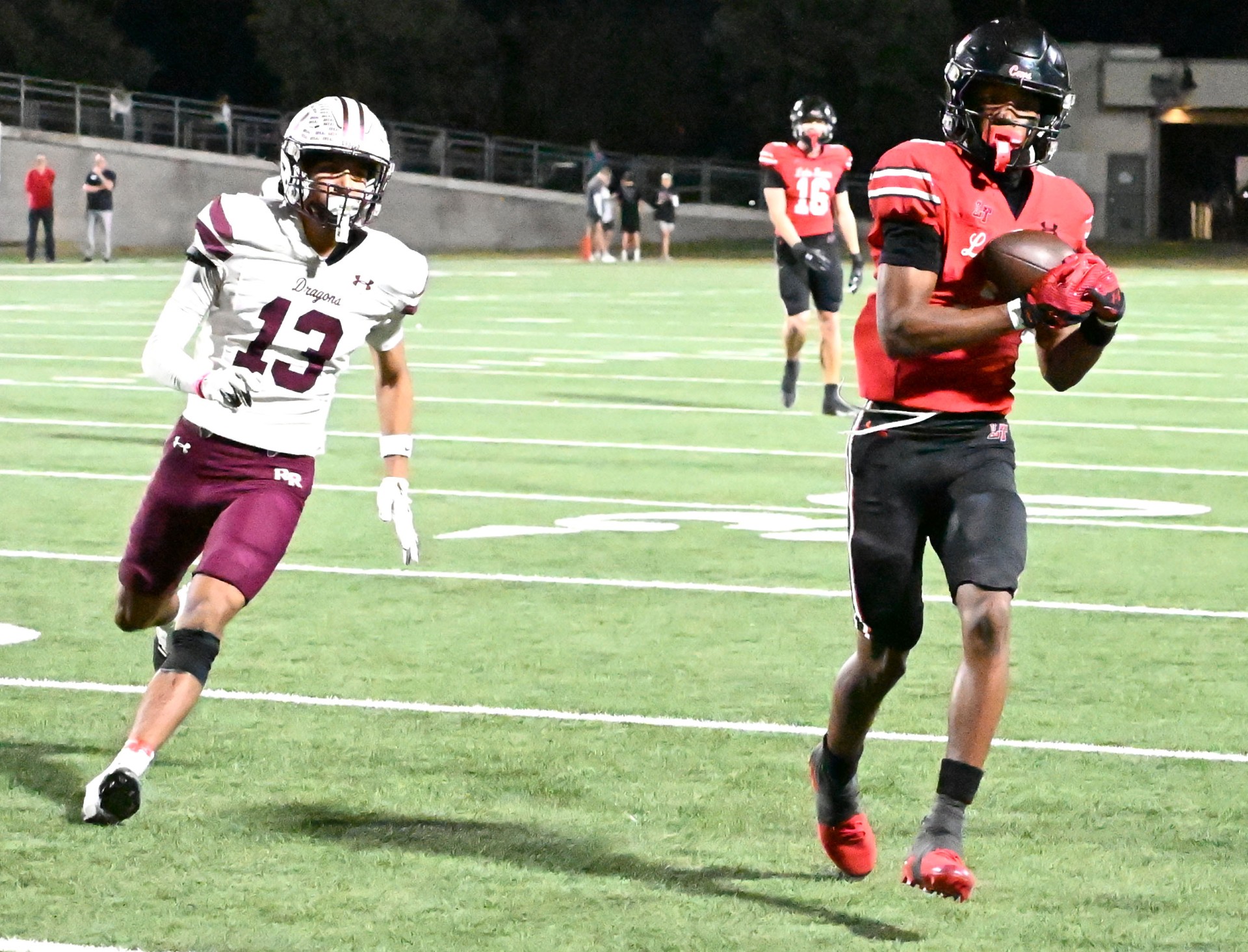 High school football: Lake Travis beats Round Rock in Class 6A DII