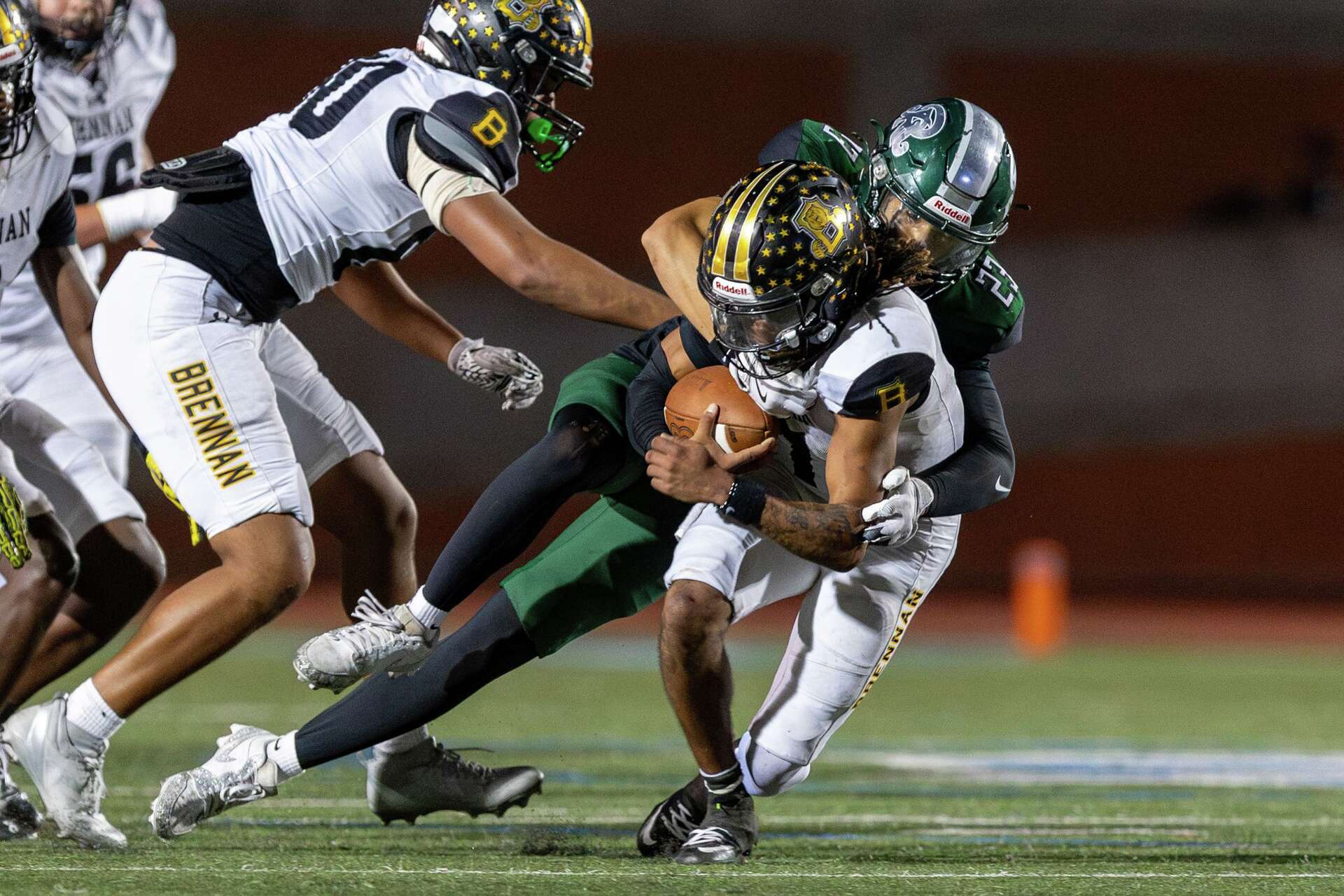 Brennan offense too much for Reagan in football playoffs