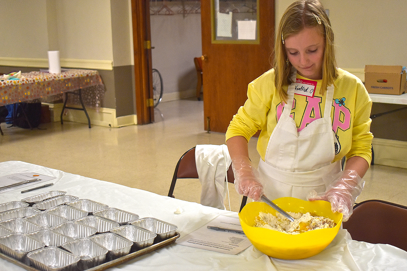 Students make pumpkin bread for homeless