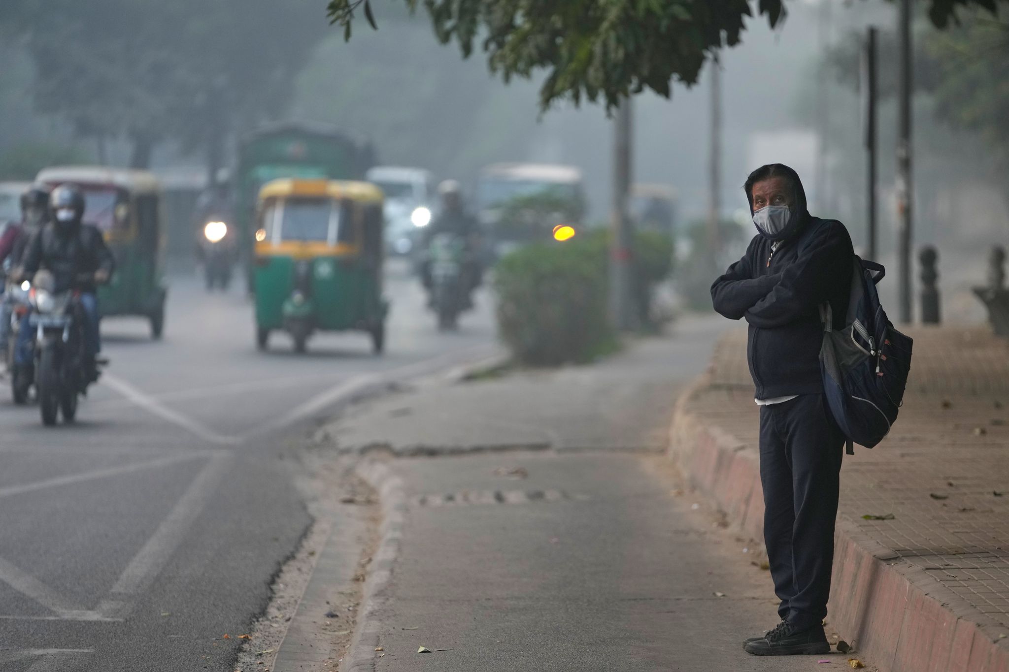 Photos show the daily struggle to breathe in New Delhi's dense winter smog