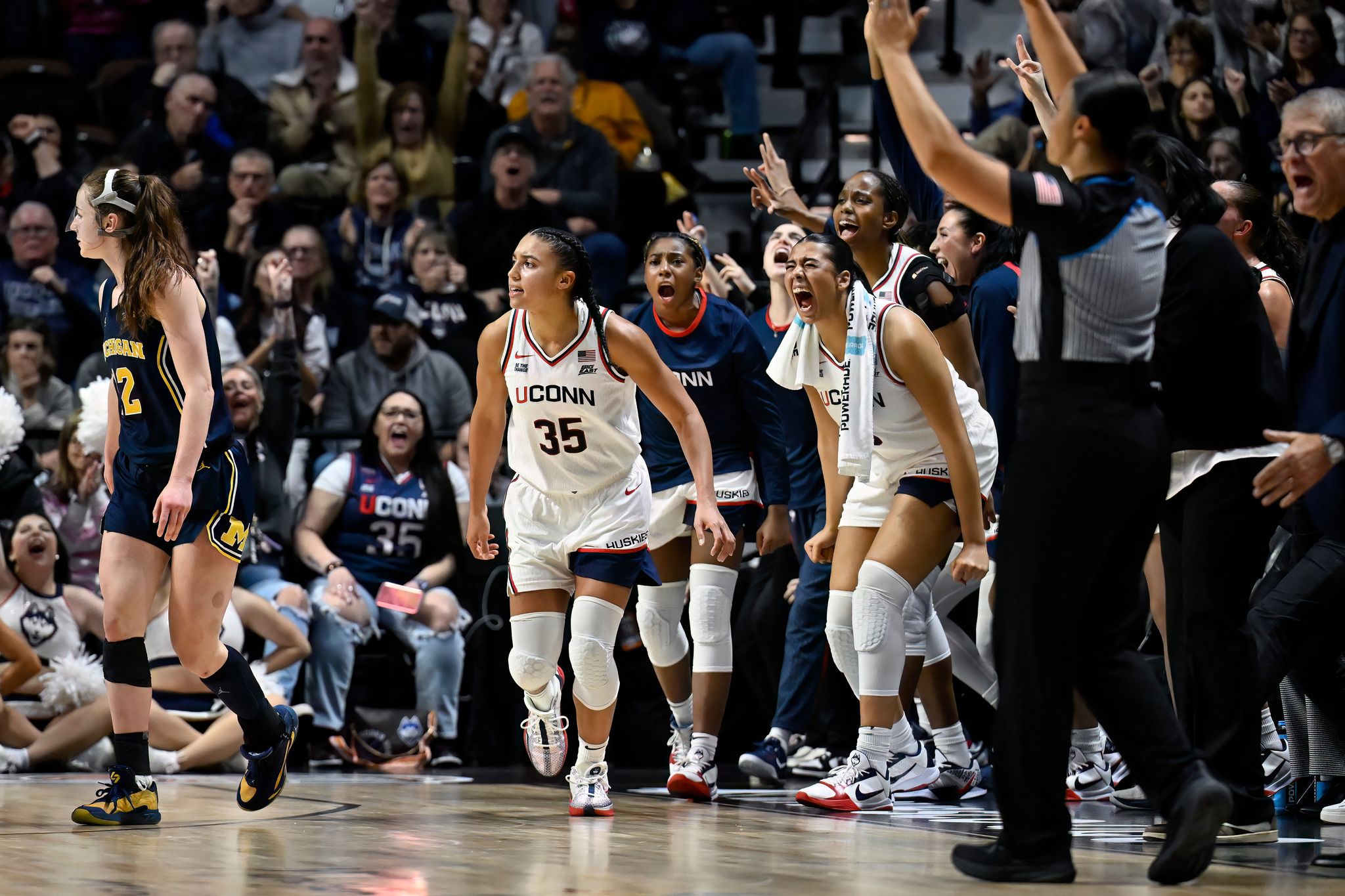 No. 1 UConn holds off No. 6 Michigan 72-69