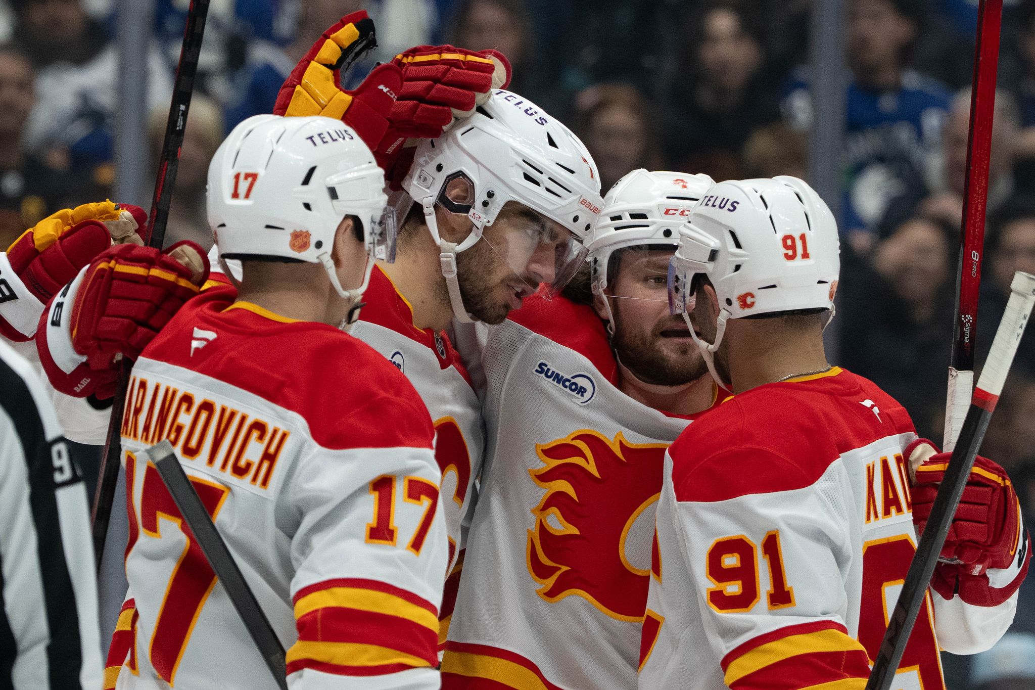Flames beat Canucks 5-2 to finish back-to-back set with 3rd straight win