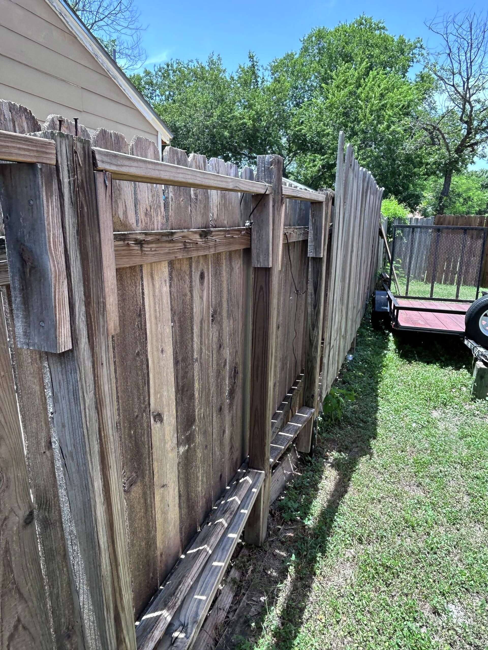Neighbor fence and tree issues: learn who pays, what to do