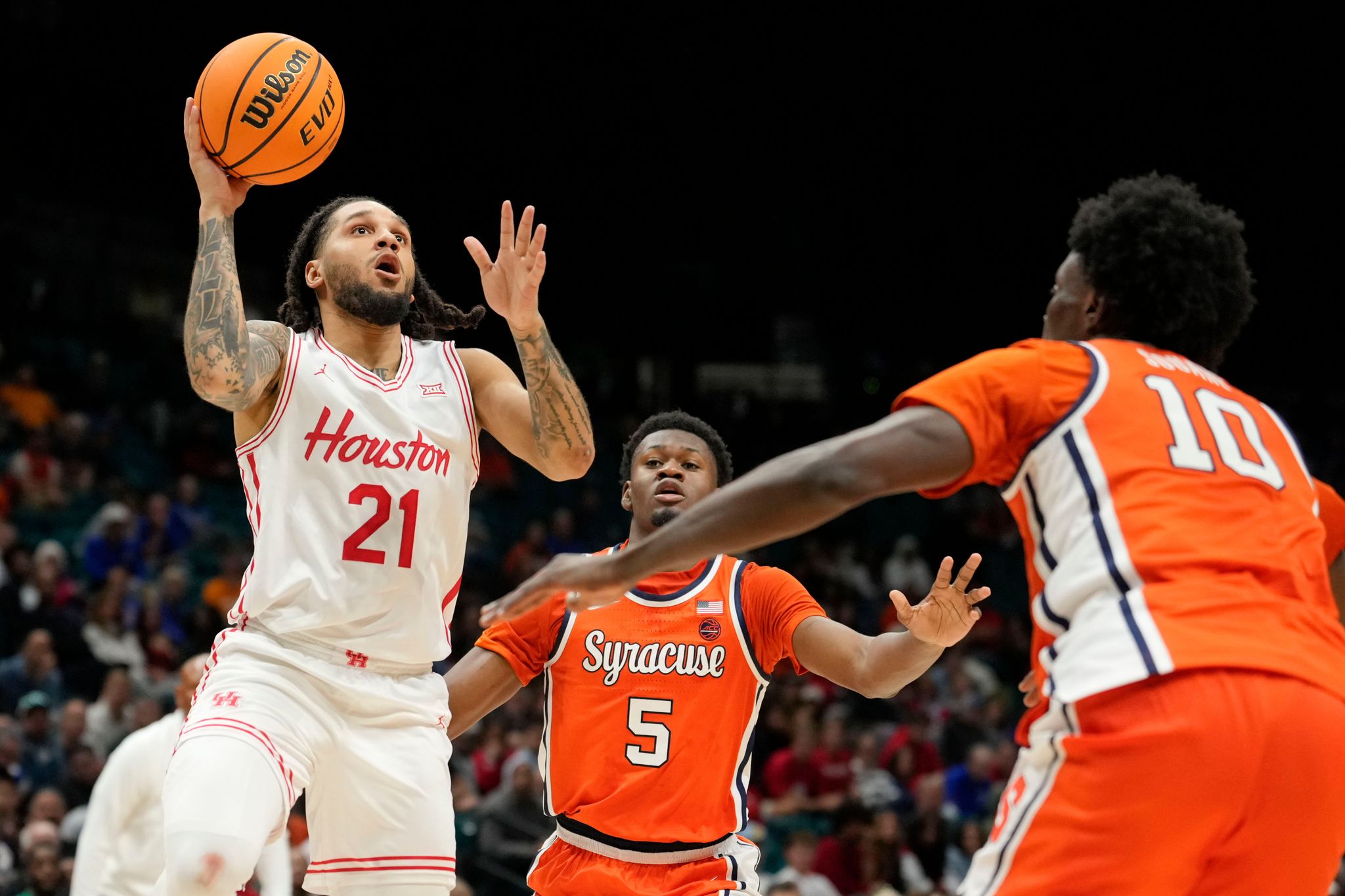 Sharp, Uzan power No. 3 Houston past Syracuse in OT