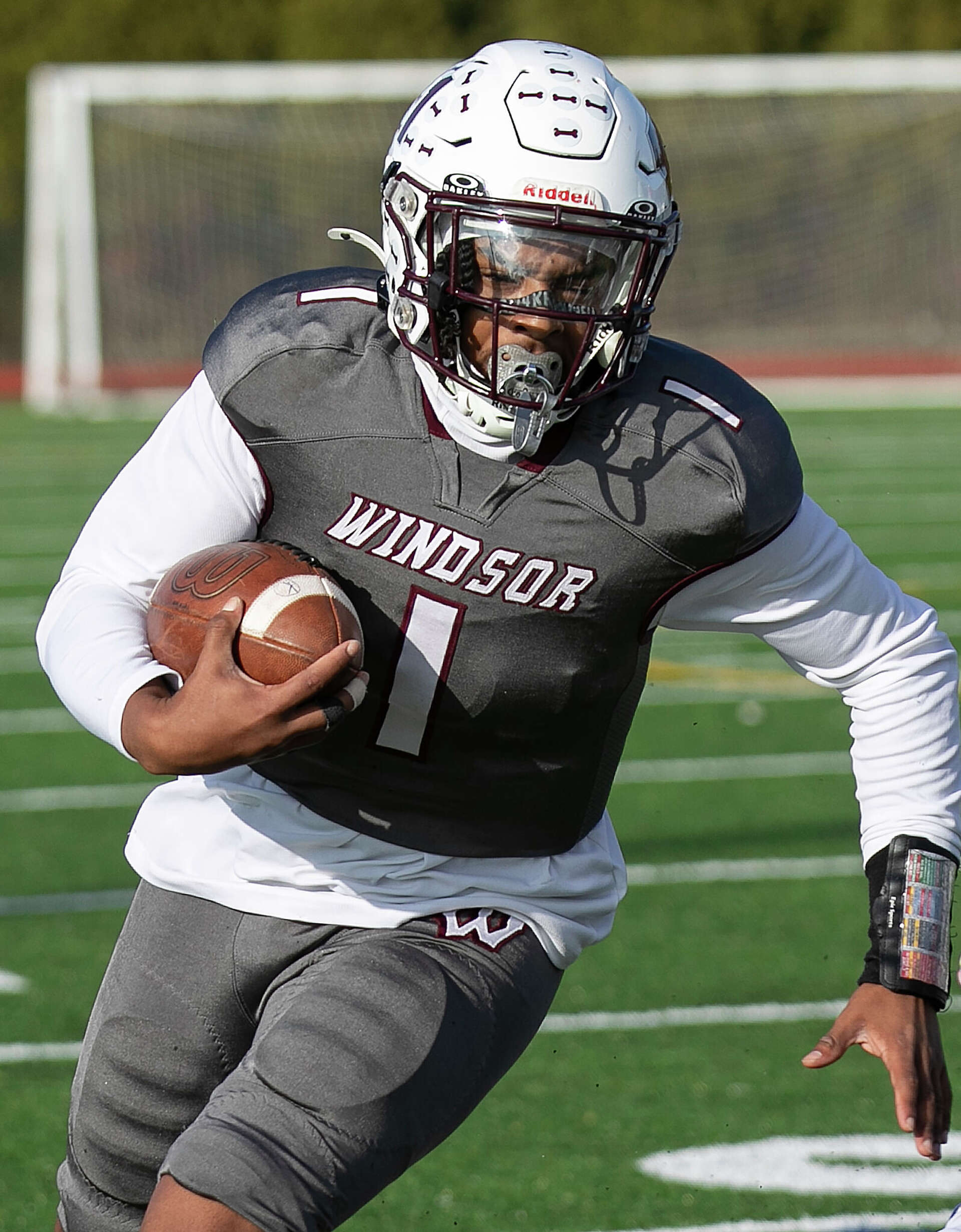 CT football standout QB A.J. Robinson goes out a CIAC champion