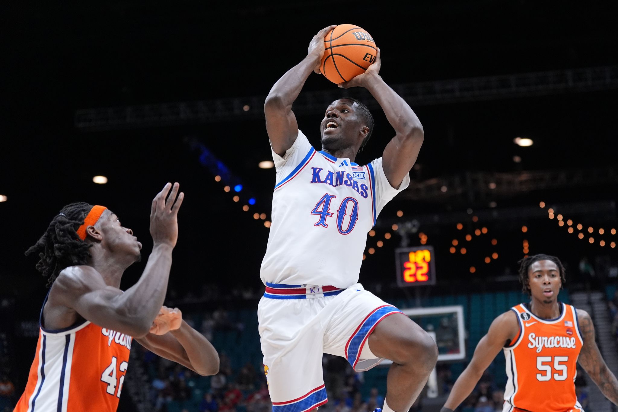 Double-doubles by Tre White and Flory Bidunga help Kansas beat Syracuse ...