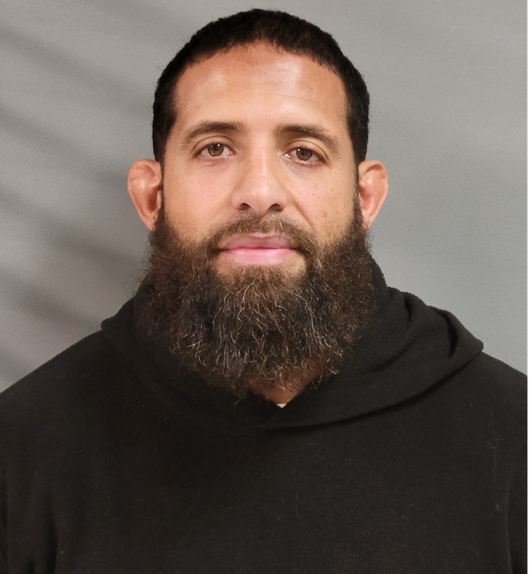 Norwalk cop was pulling 400-pound sled while on workers' comp: Warrant