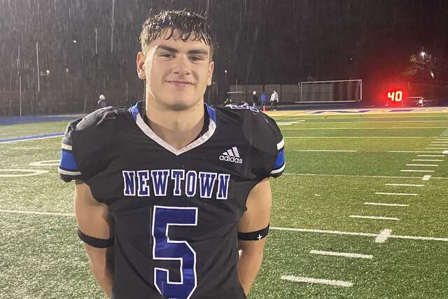 Newtown football topples Masuk in Thanksgiving Eve battle in Newtown