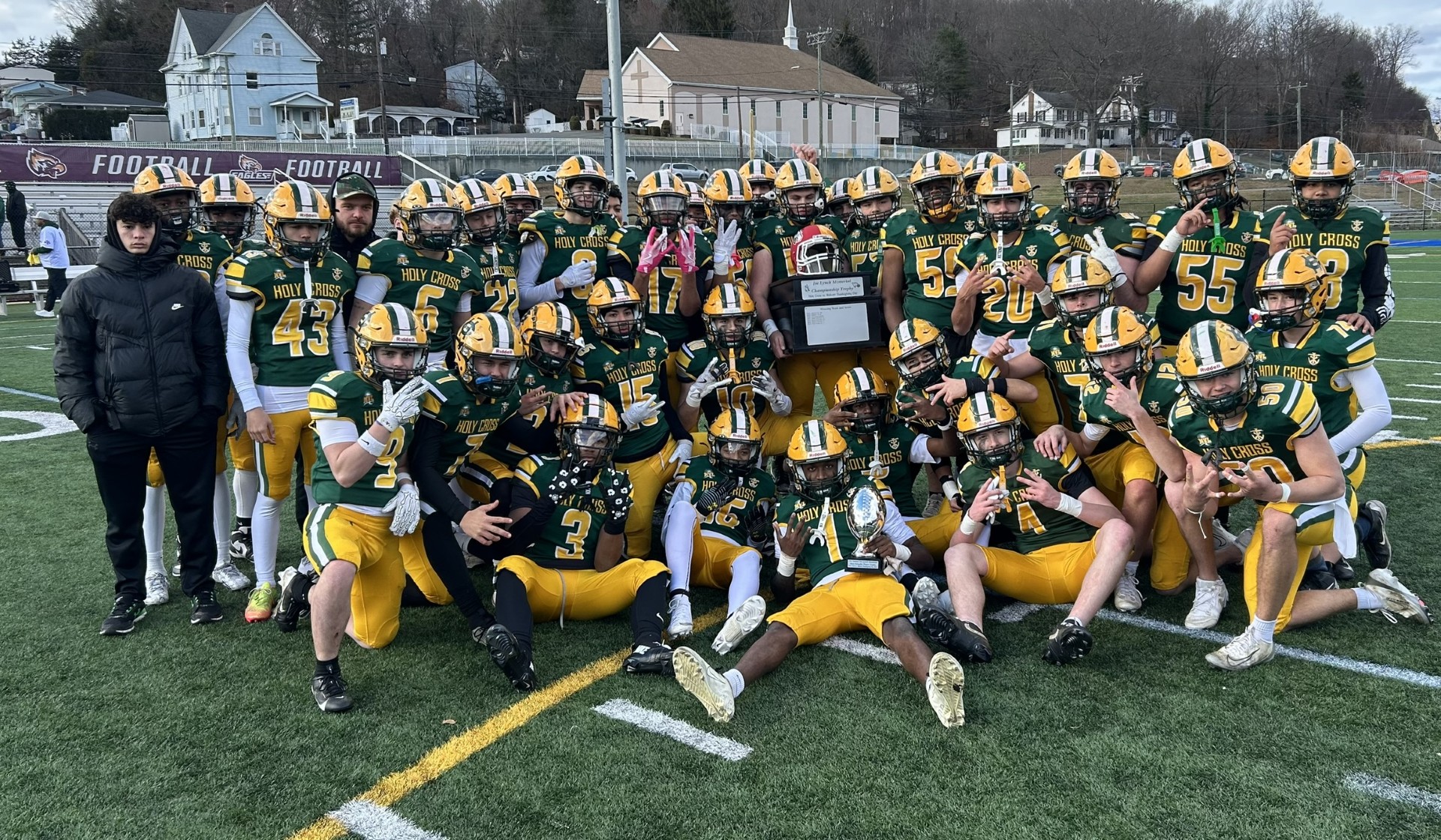 Holy Cross football rolls past Wolcott to clinch a playoff spot