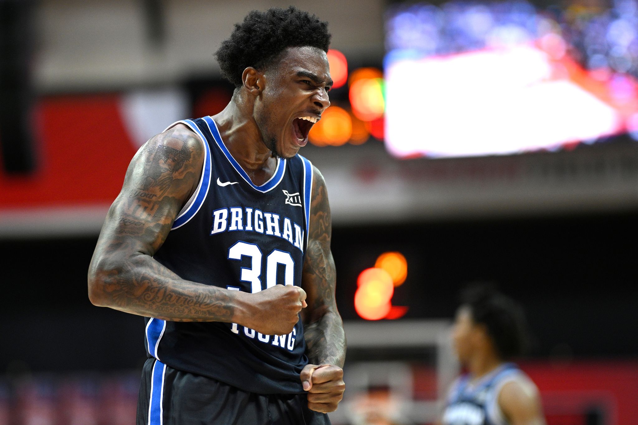 Davis scores 18, No. 9 BYU uses second-half surge to beat Miami 72-62