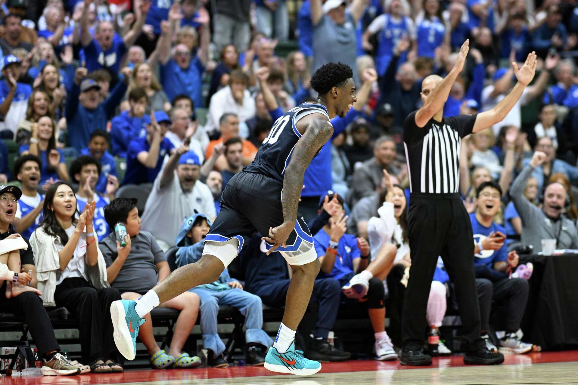 Davis scores 18, No. 9 BYU uses second-half surge to beat Miami 72-62