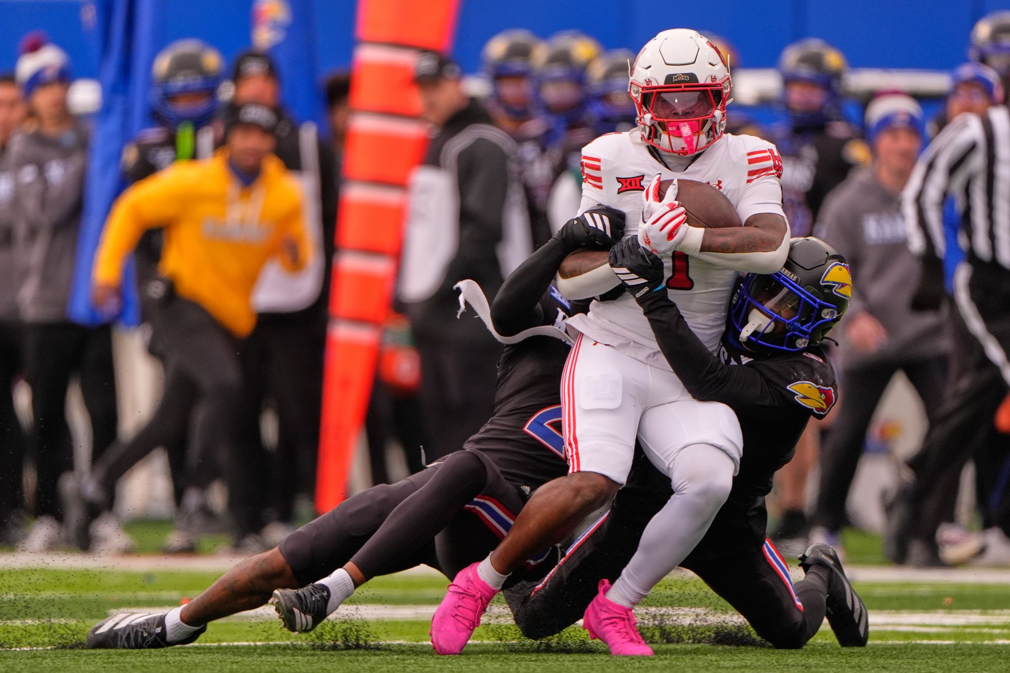 No. 14 Utah rallies to beat Kansas 31-21 and keep its slim Big 12 championship hopes alive